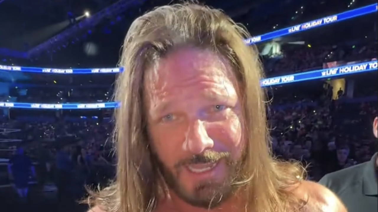 AJ Styles Reacts To Fan Asking Him To Sign AEW Title - Wrestlezone