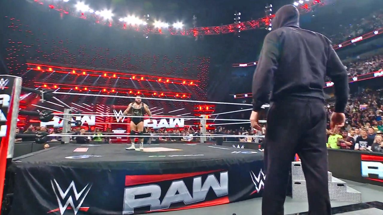 Masked Man Attacks Logan Paul On WWE RAW After Austin Theory Assault